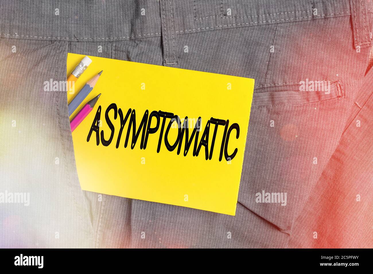 Writing note showing Asymptomatic. Business concept for a condition or ...