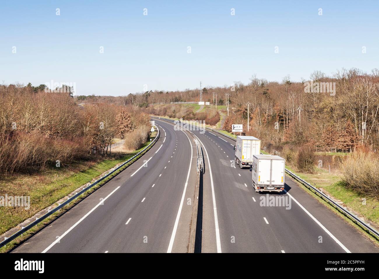 Trucks and traffic on a busy highway Stock Photo - Alamy