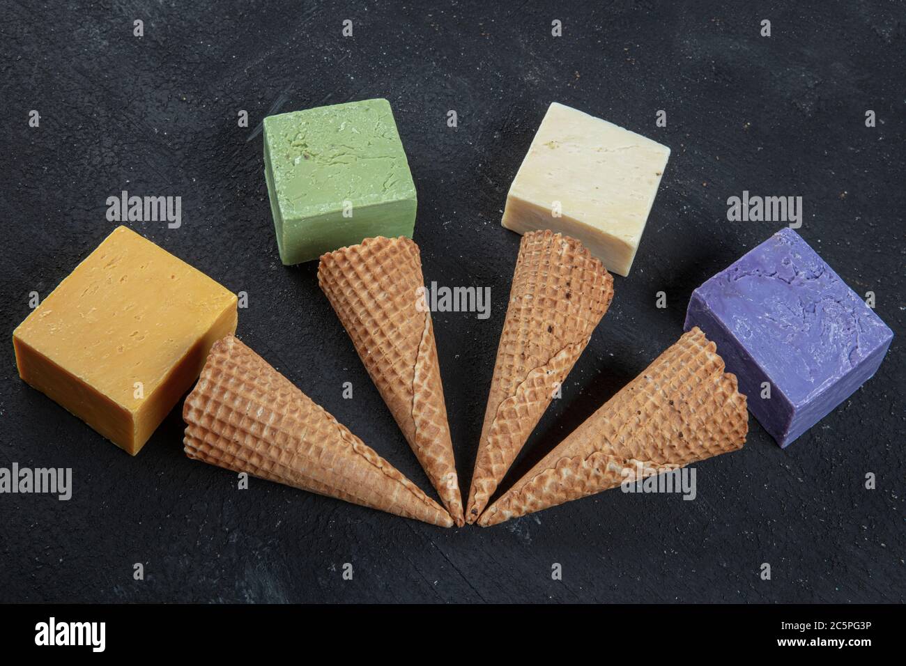 Ice cream cone and natural soaps. Many different handmade soap bars on ...