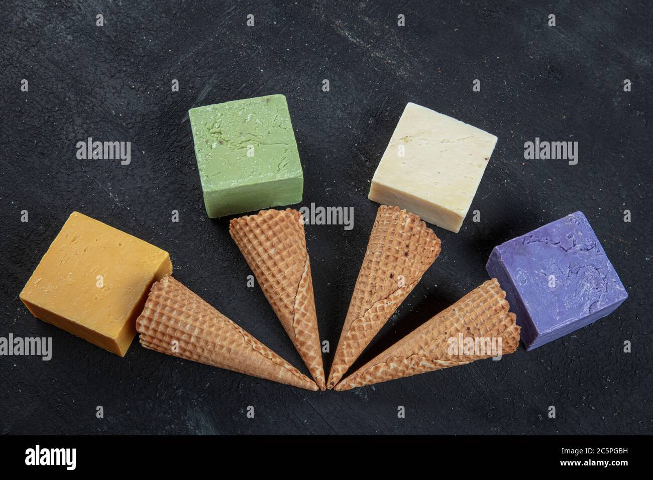Ice cream cone and natural soaps. Many different handmade soap bars on ...