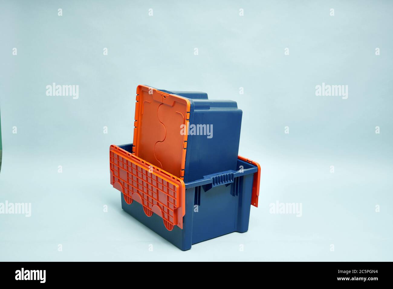 Plastic storage boxes. Boxes for the delivery of products. Orderly ...