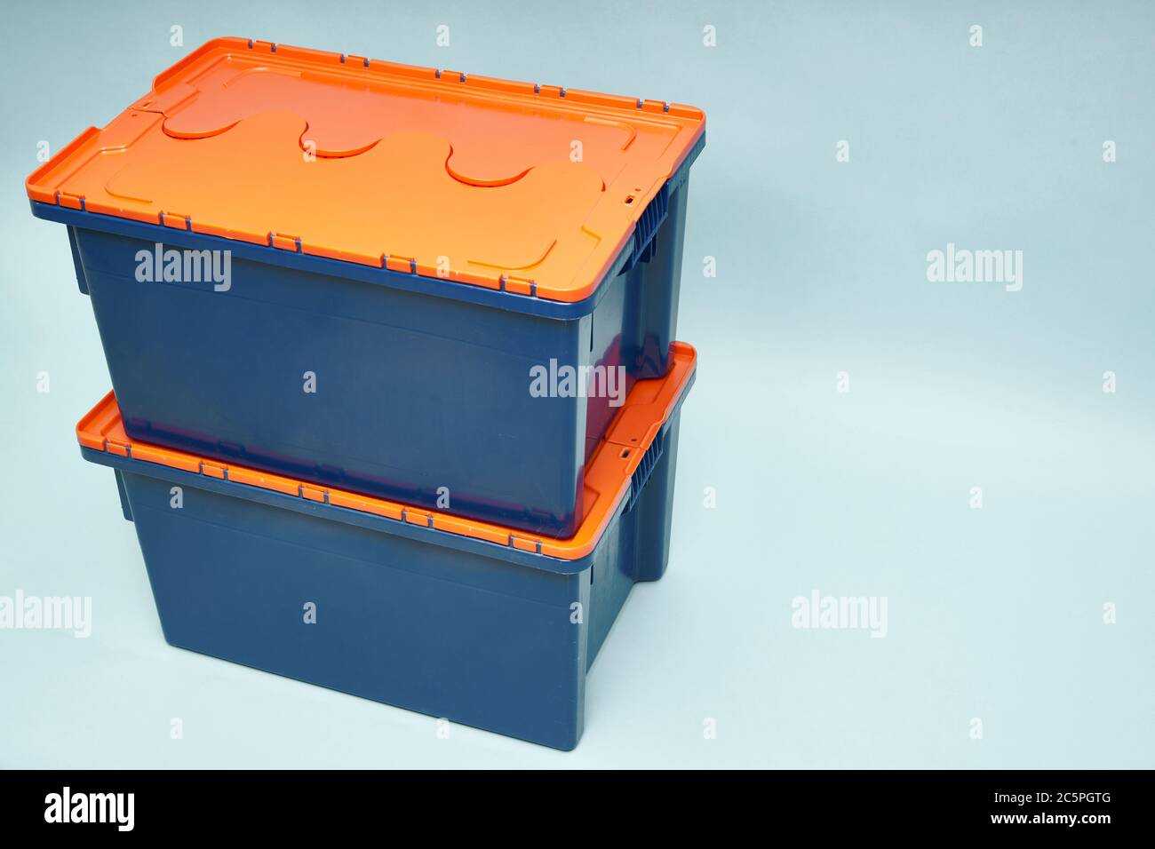 Plastic storage boxes. Boxes for the delivery of products. Orderly ...