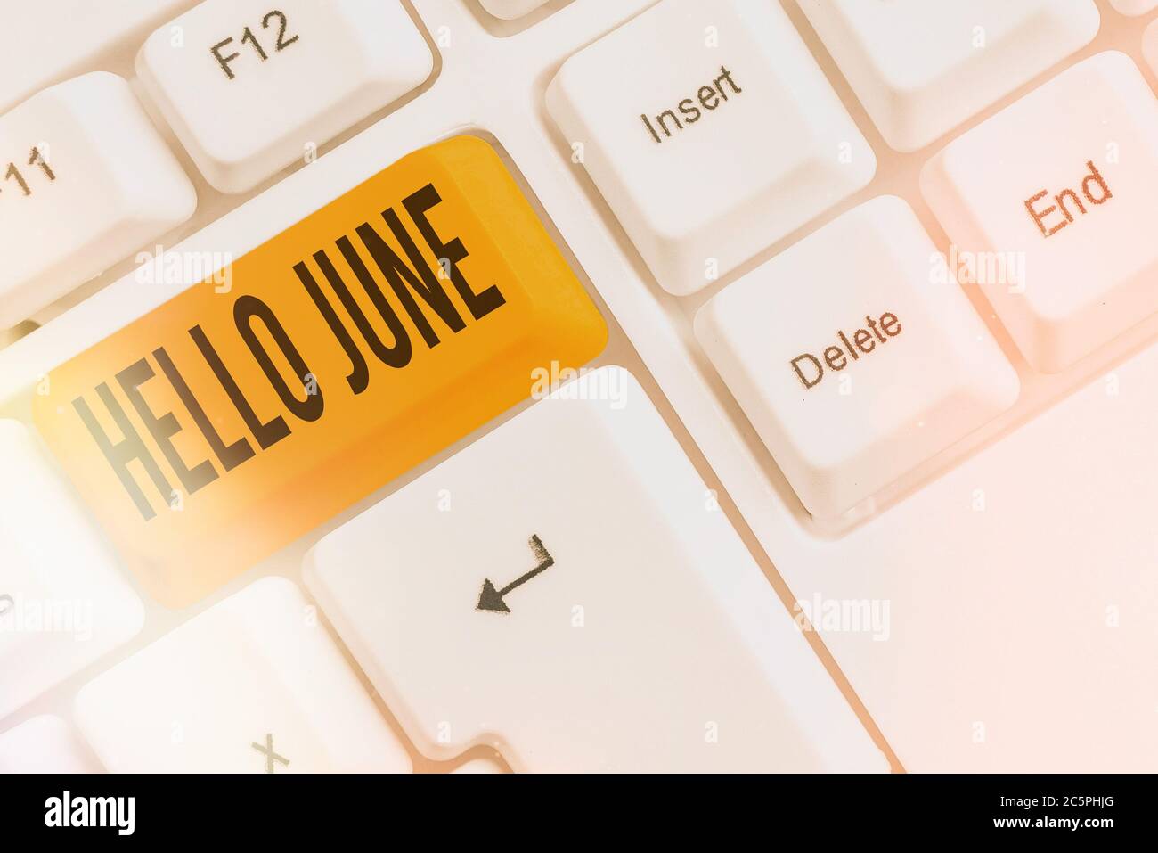 Writing note showing Hello June. Business concept for a new month to ...