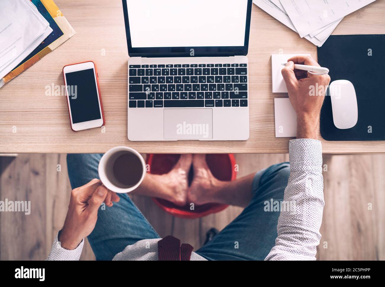 Feet under table hi-res stock photography and images - Alamy