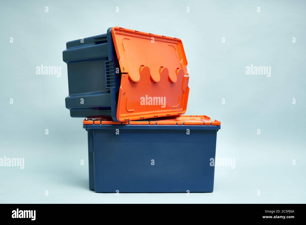 Plastic storage boxes. Boxes for the delivery of products. Orderly ...