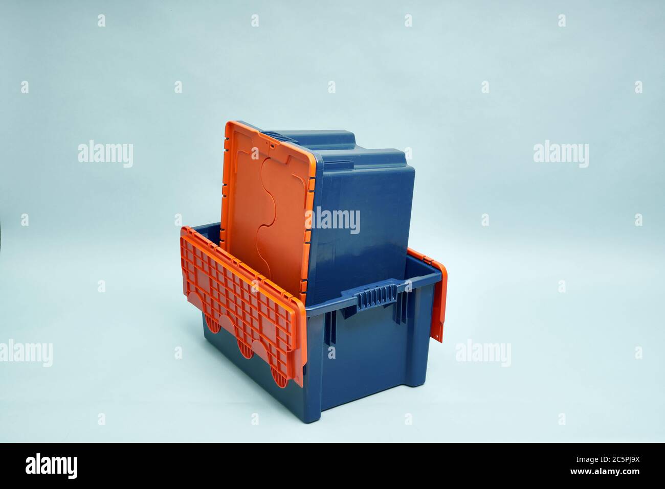 Plastic storage boxes. Boxes for the delivery of products. Orderly ...