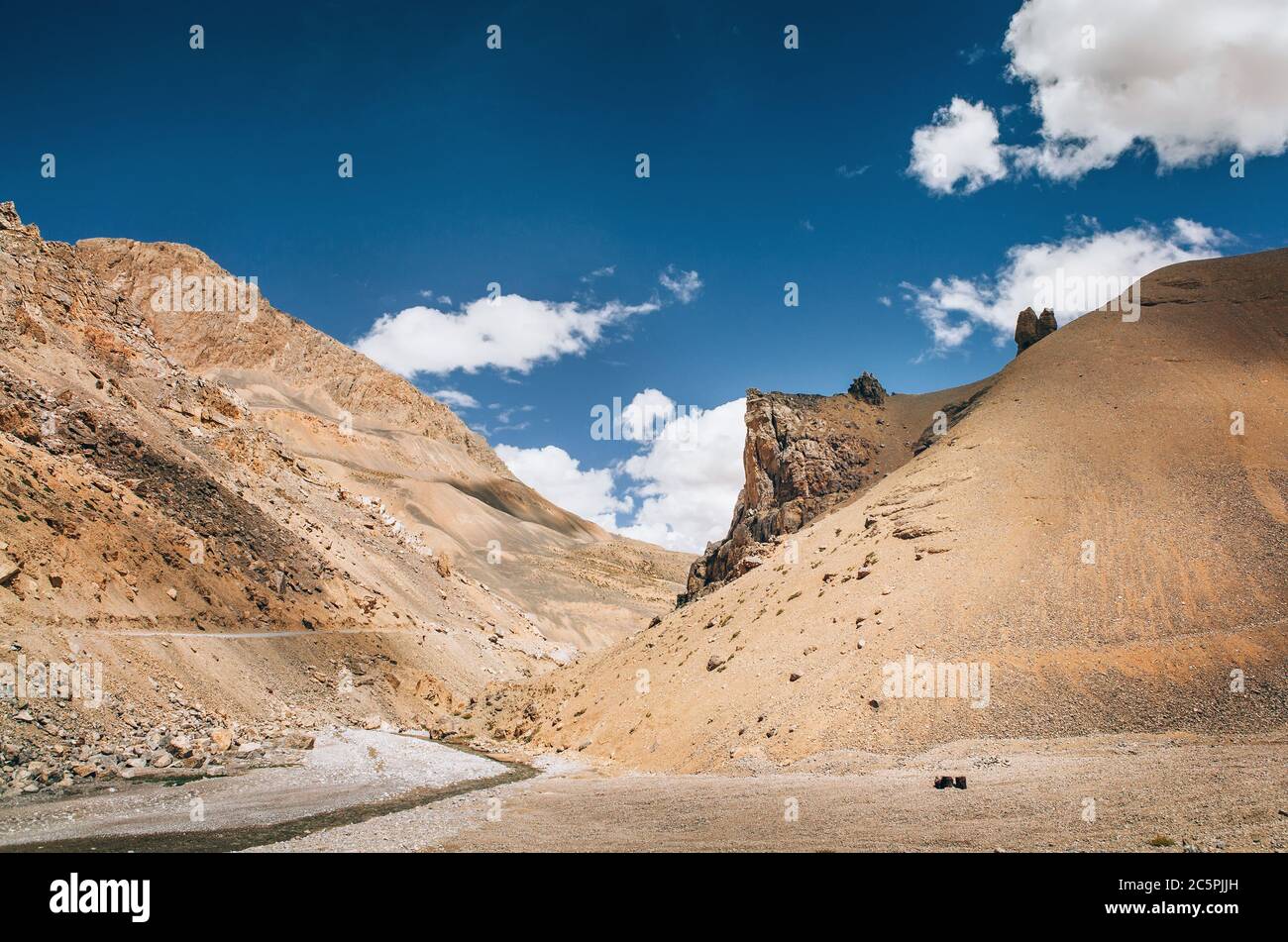 Picturesque mountain landscape on the endless Leh - Manali road. Blue ...