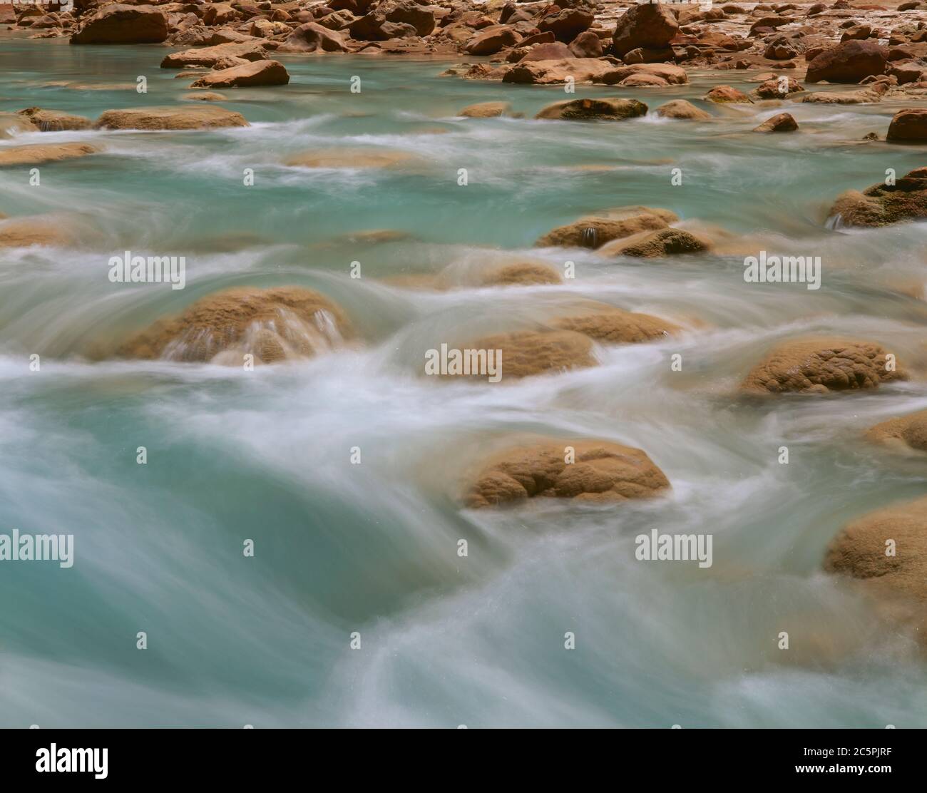 Grand Canyon National Park AZ/MAY An aqua colored Little Colorado River ...