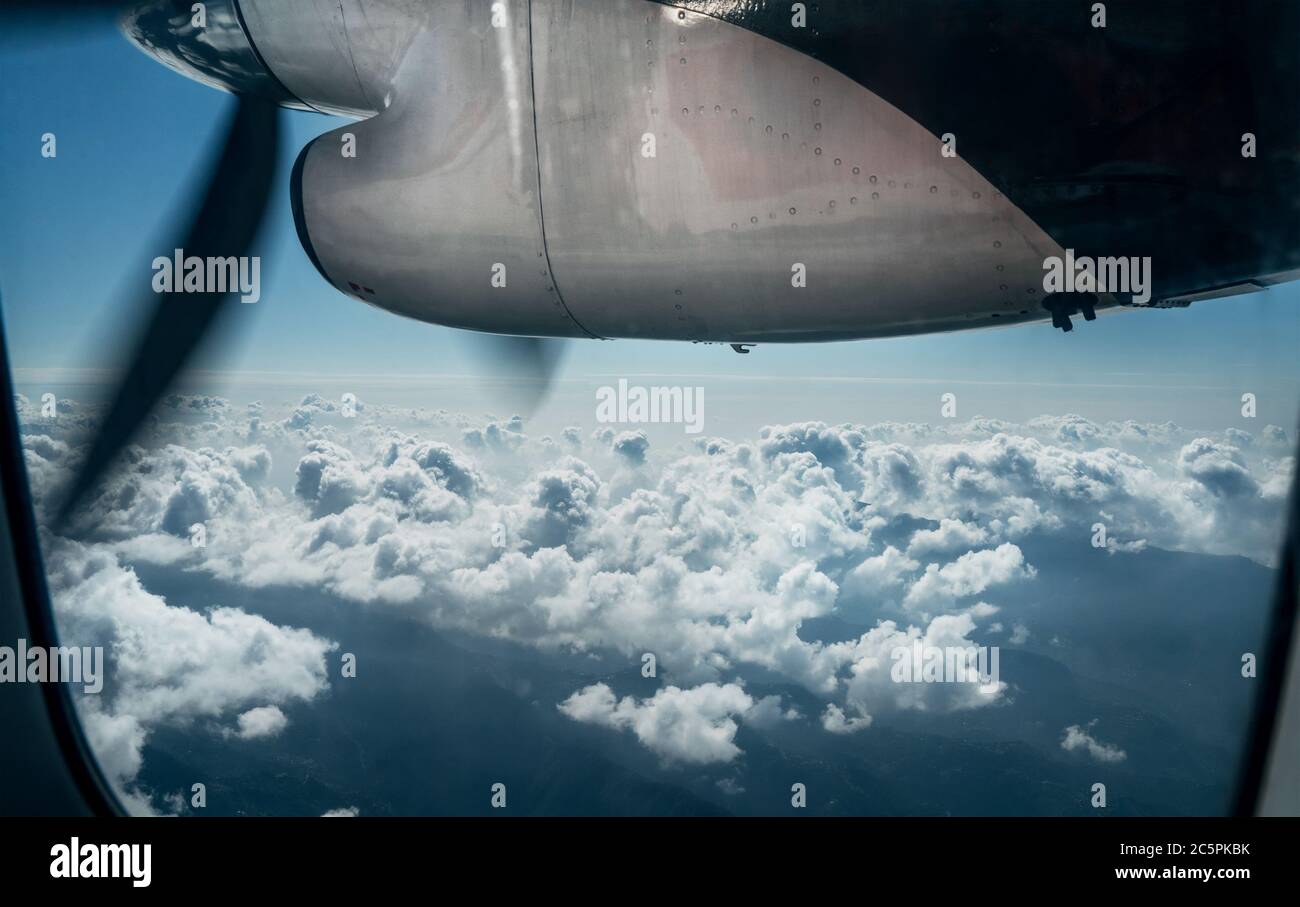 Twin-engine short-range plane engine propeller during the flight to ...
