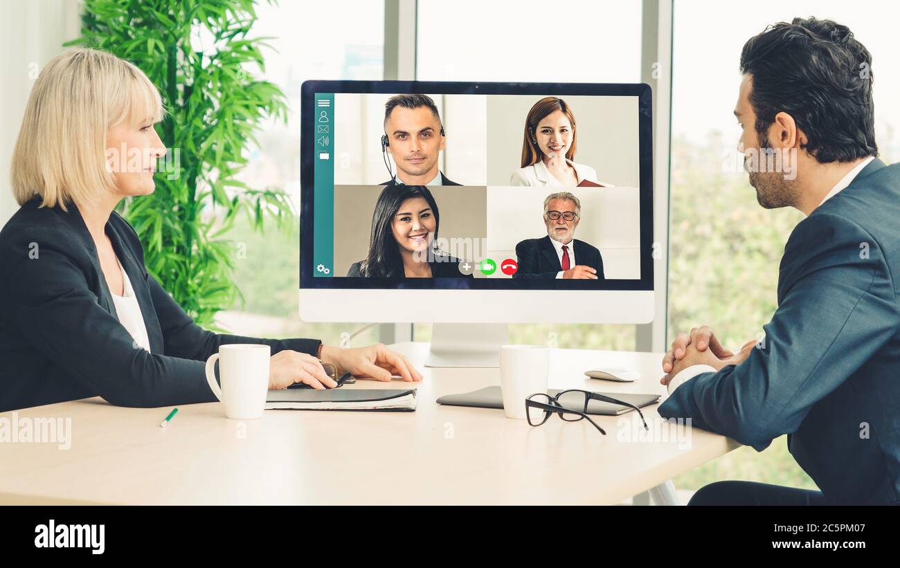 Business people video conferencing hi-res stock photography and images ...