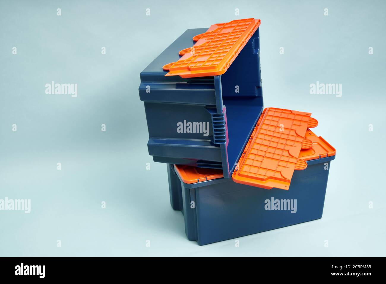 Plastic storage boxes. Boxes for the delivery of products. Orderly ...