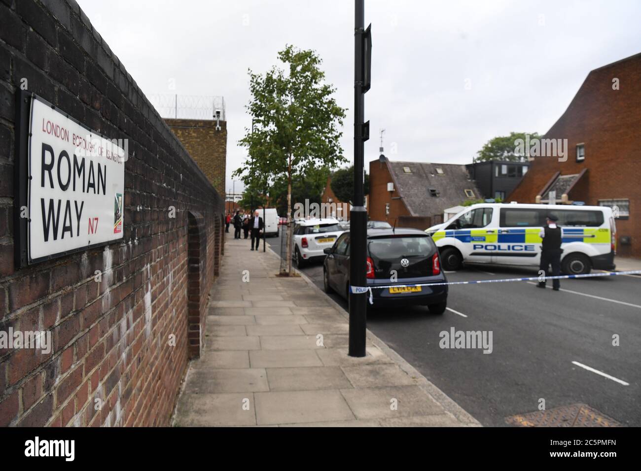 The police cordon at the scene at roman way hi-res stock photography ...