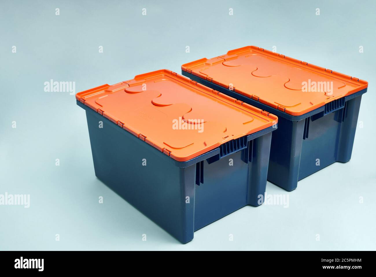 Plastic storage boxes. Boxes for the delivery of products. Orderly ...