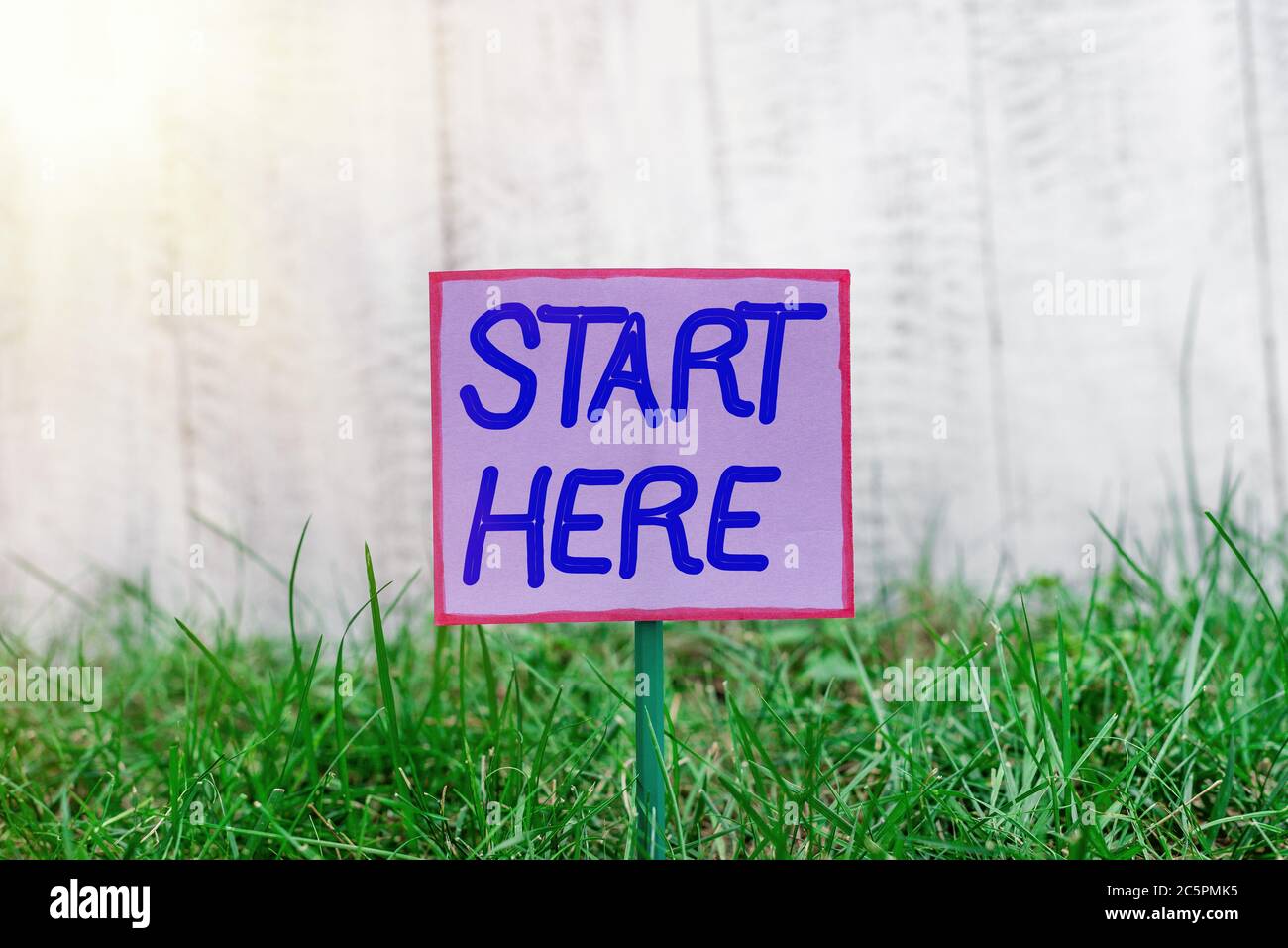 Text sign showing Start Here. Business photo text an act of pointing a ...