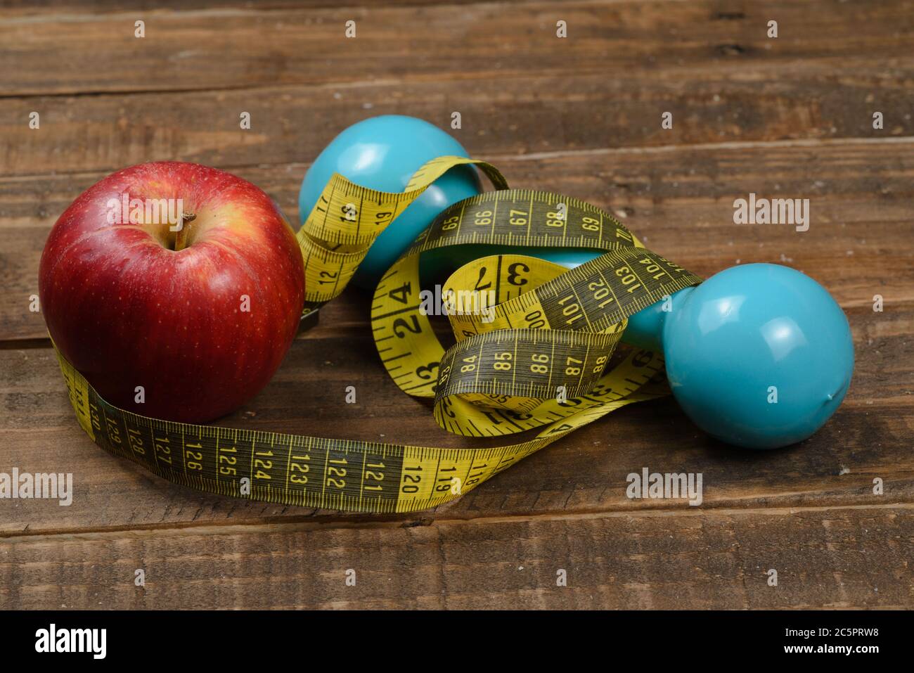 Weight control concept, with measure objects, and exercise weight, with ...