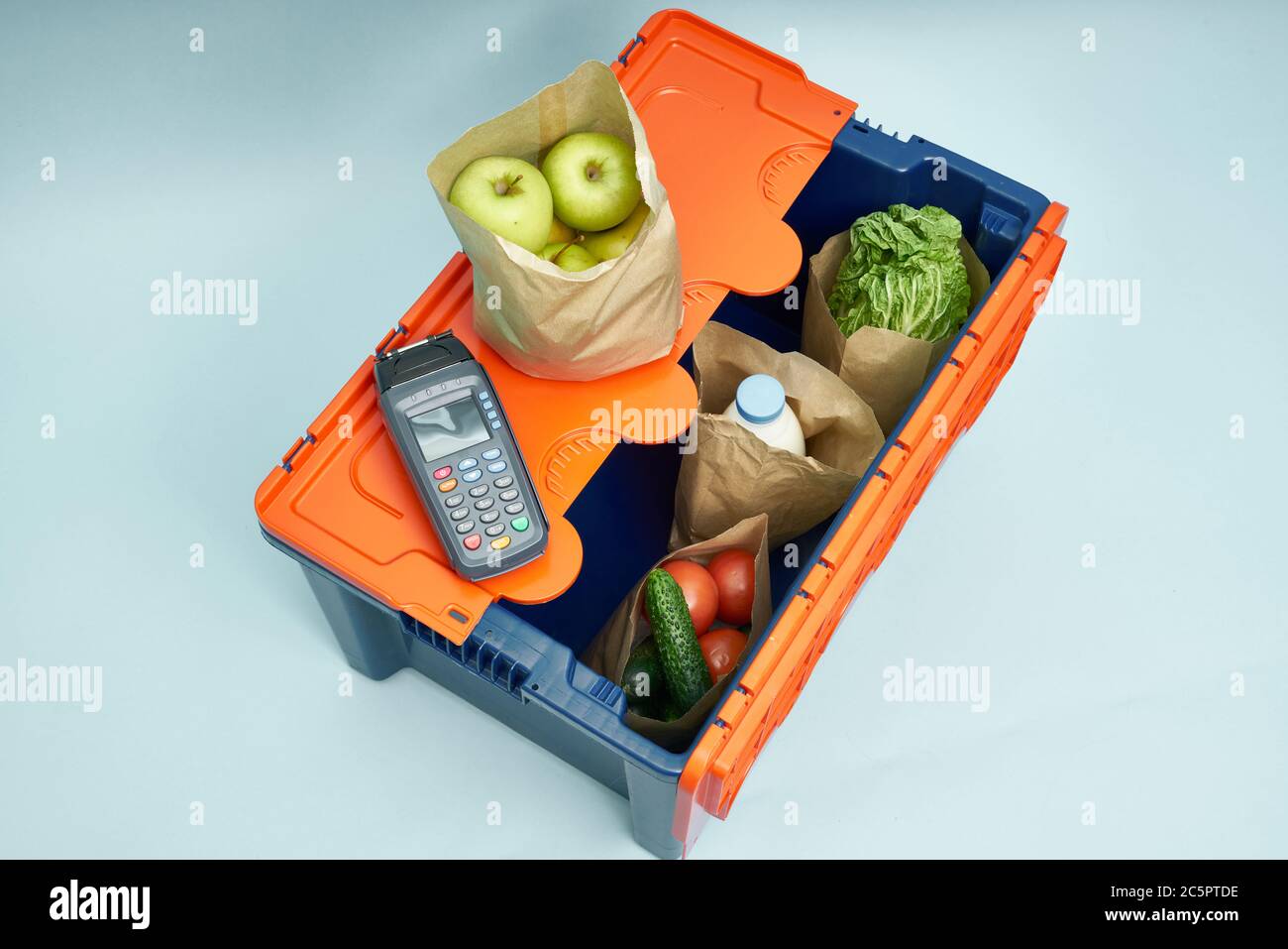 Plastic box with products. Food delivery in platinum boxes. Safe ...