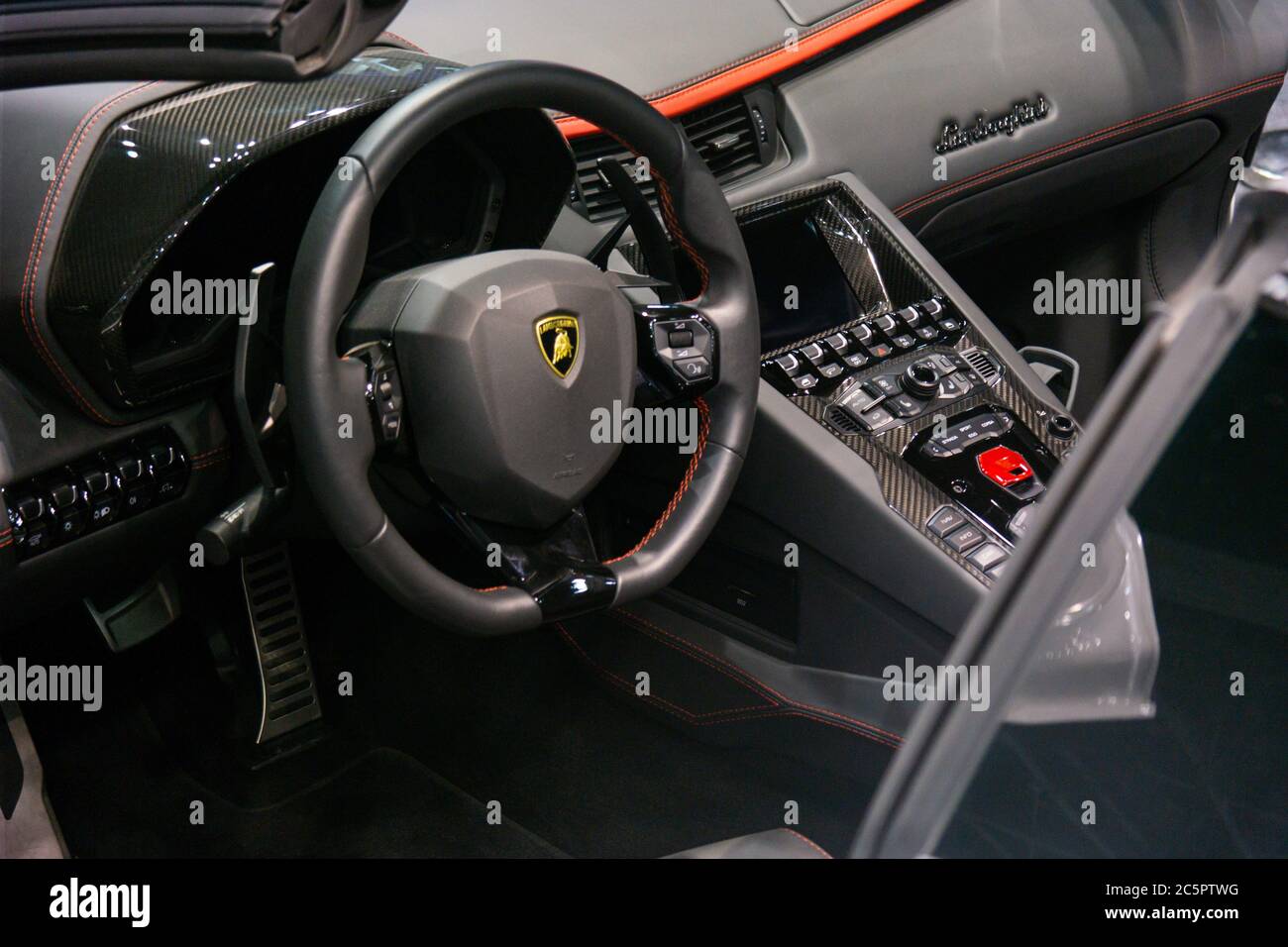 Red lambo black interior hi-res stock photography and images - Alamy
