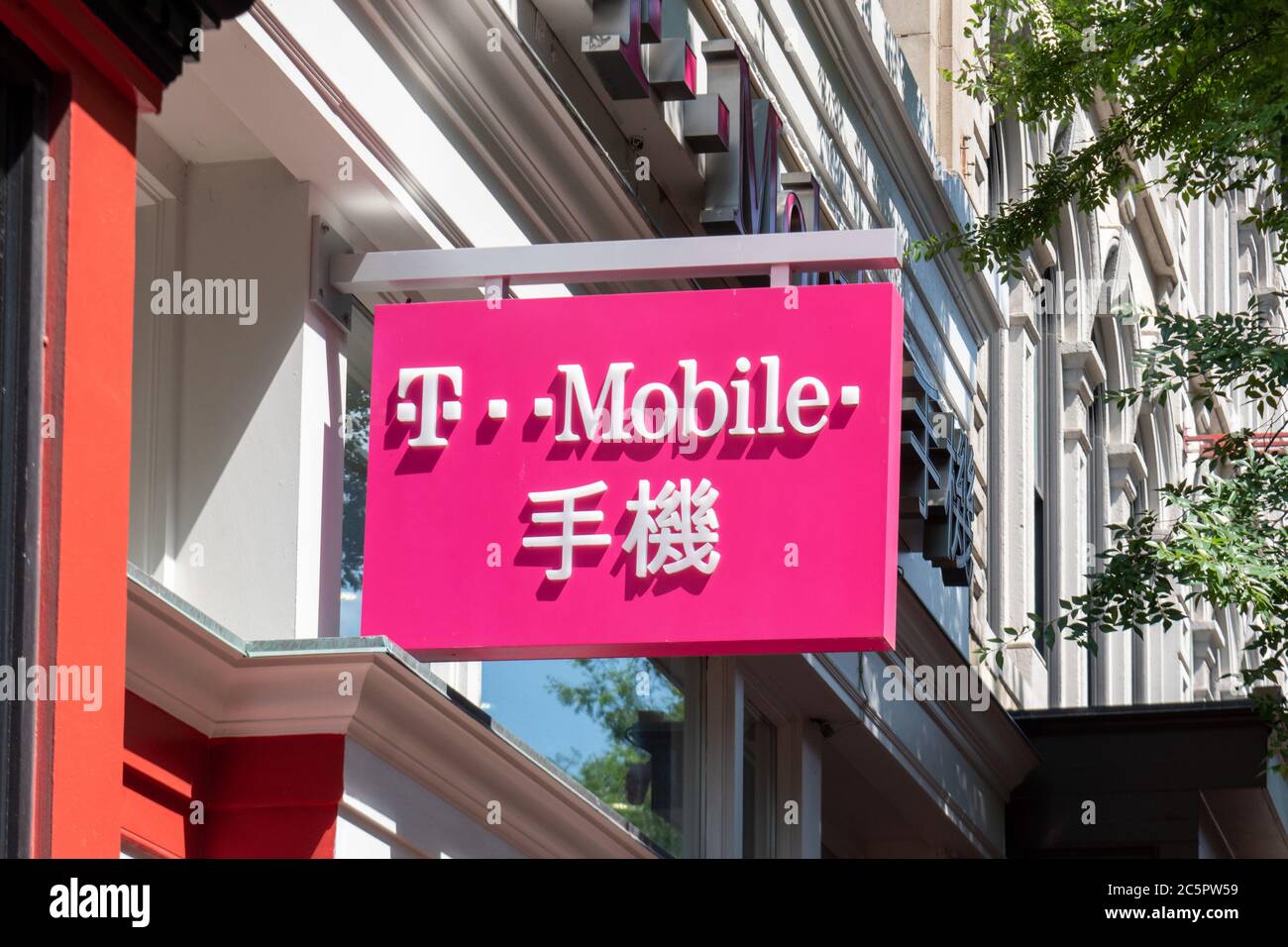 Storefront sign at the entrance of T Mobile in Washington's historic ...