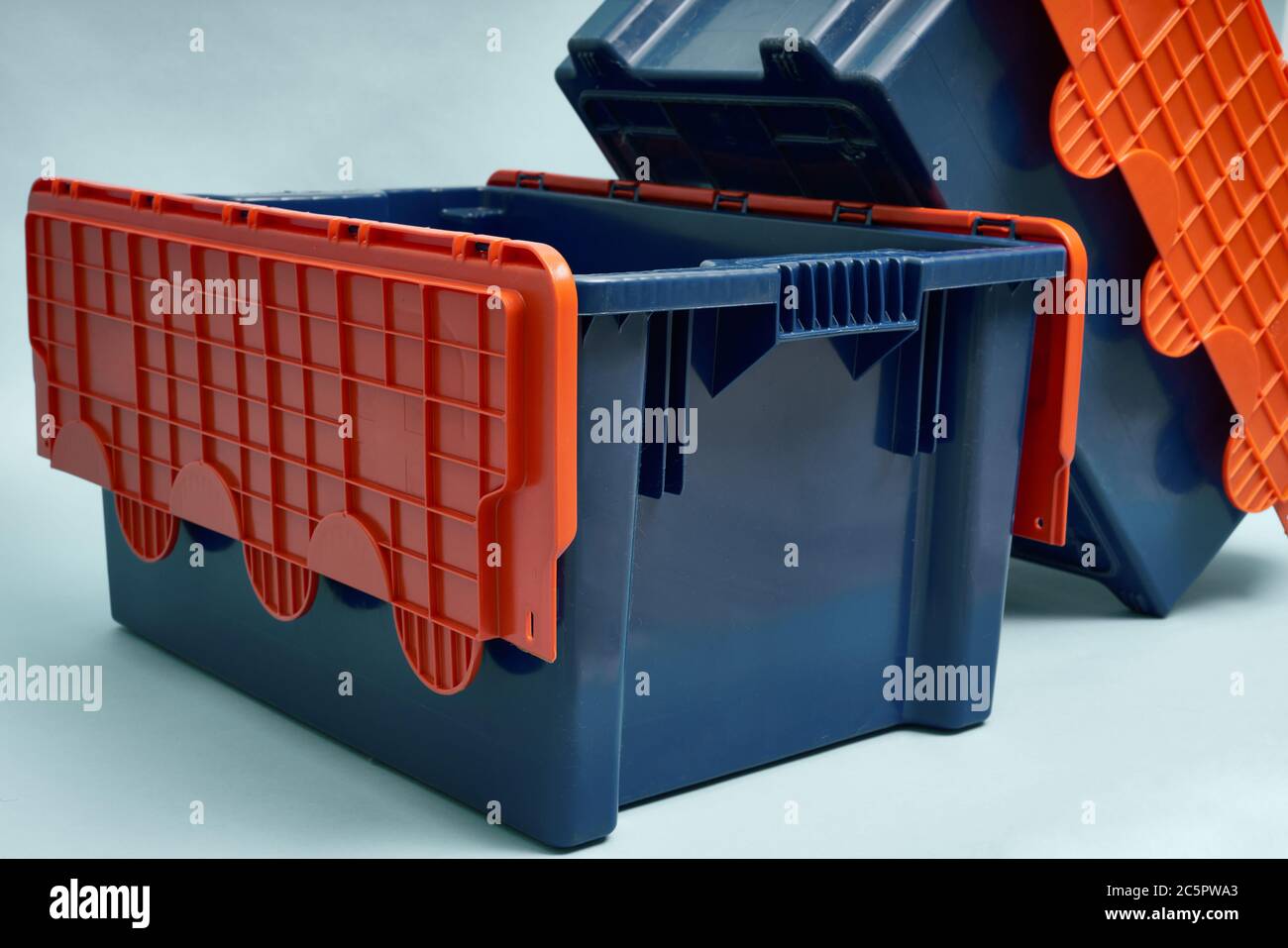 Plastic storage boxes. Boxes for the delivery of products. Orderly ...