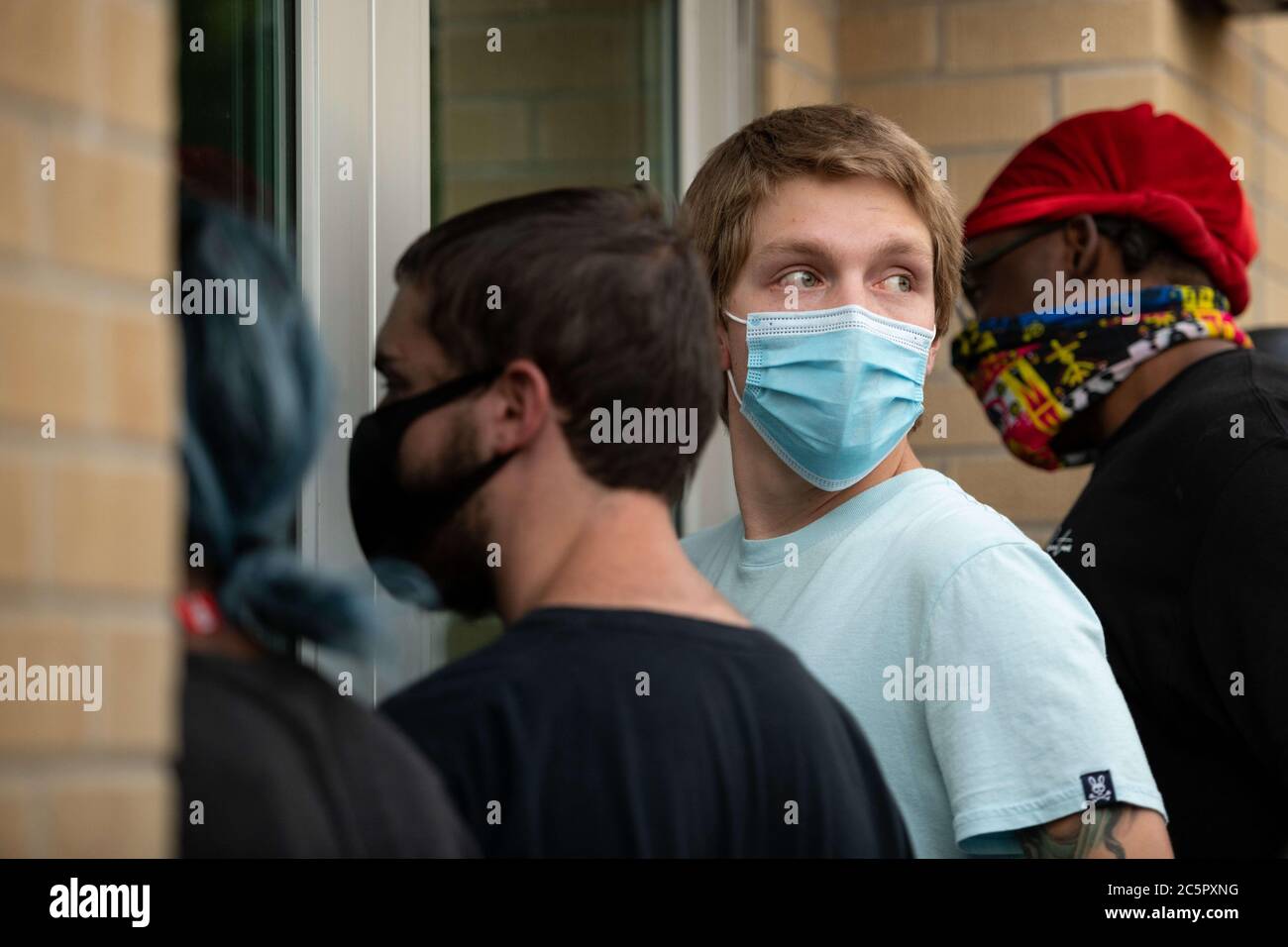Protesters form human barricade hi-res stock photography and images - Alamy