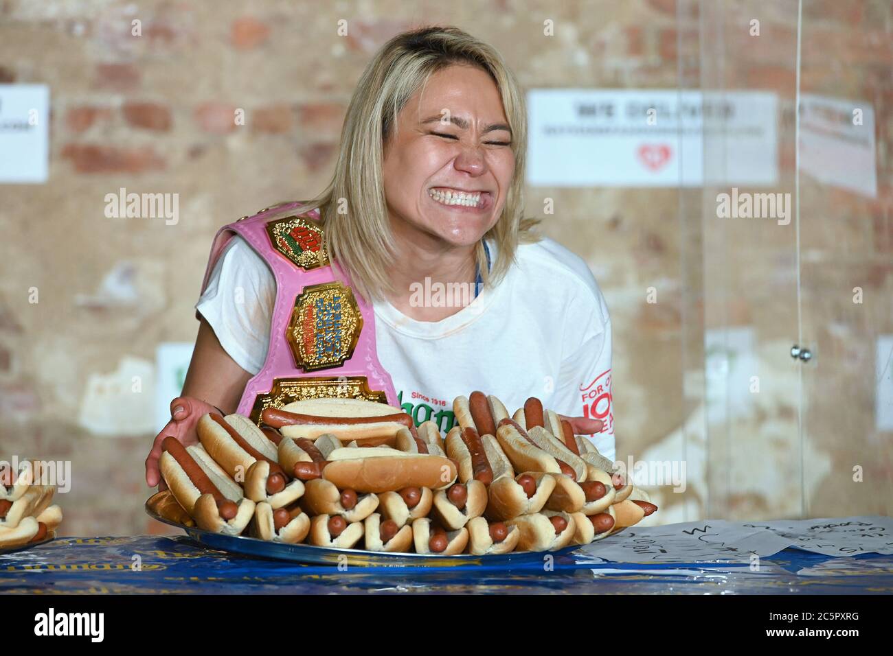 Competitive eater Miki Sudo celebrates after eating a women's world ...