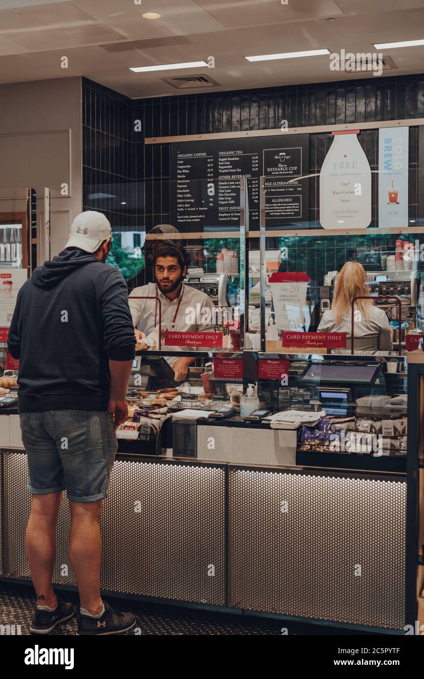 London, UK - September 07, 2019: Single customer ordering food from a ...