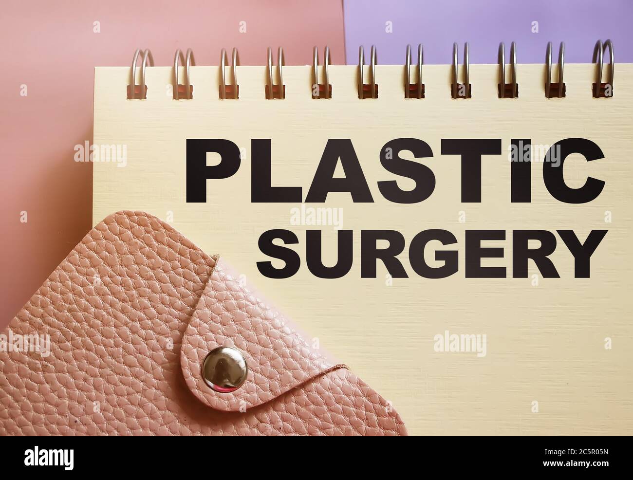 The words Plastic surgery written on a calendar planner to remind you ...