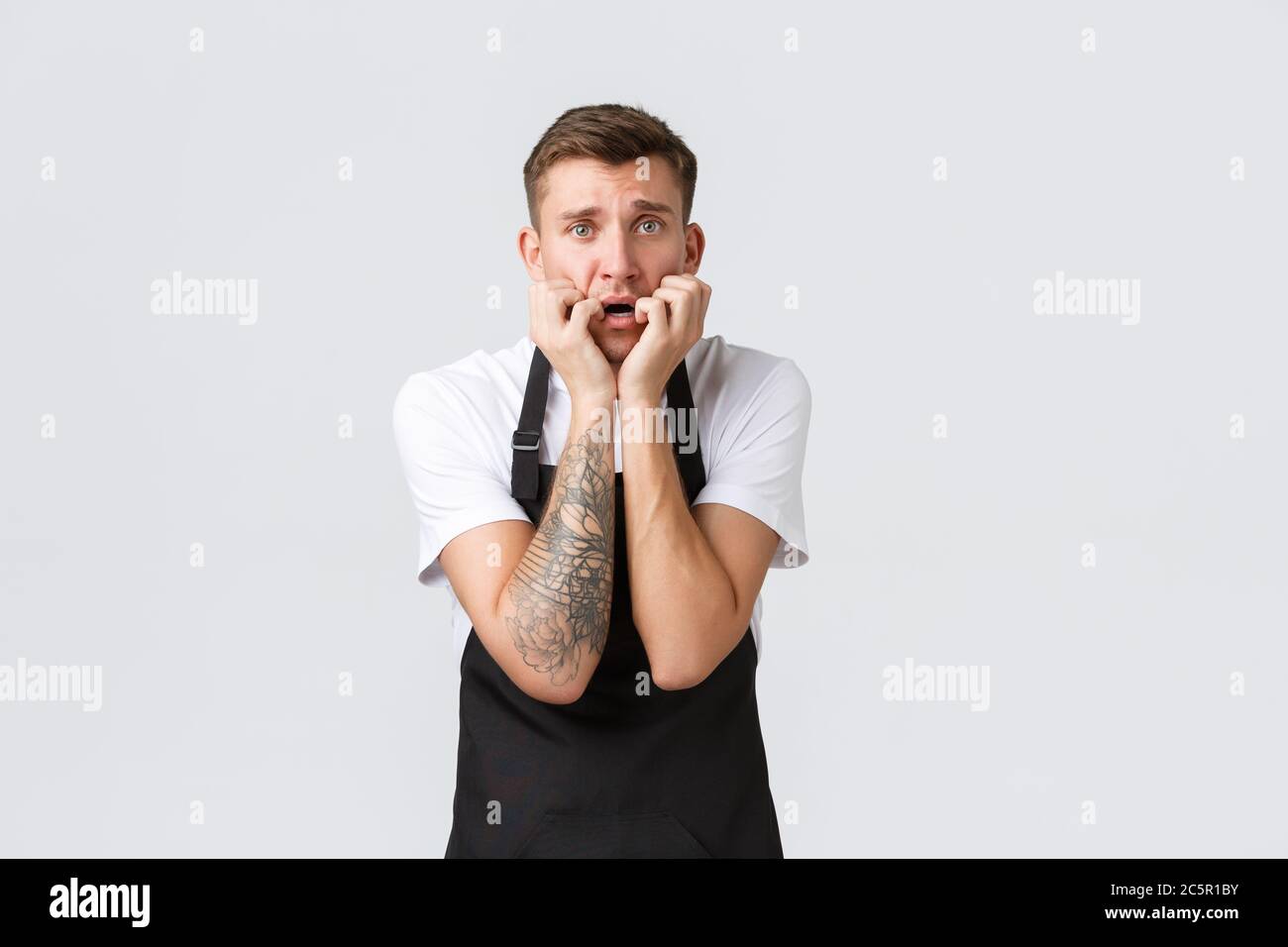 Employees, grocery stores and coffee shop concept. Scared insecure ...