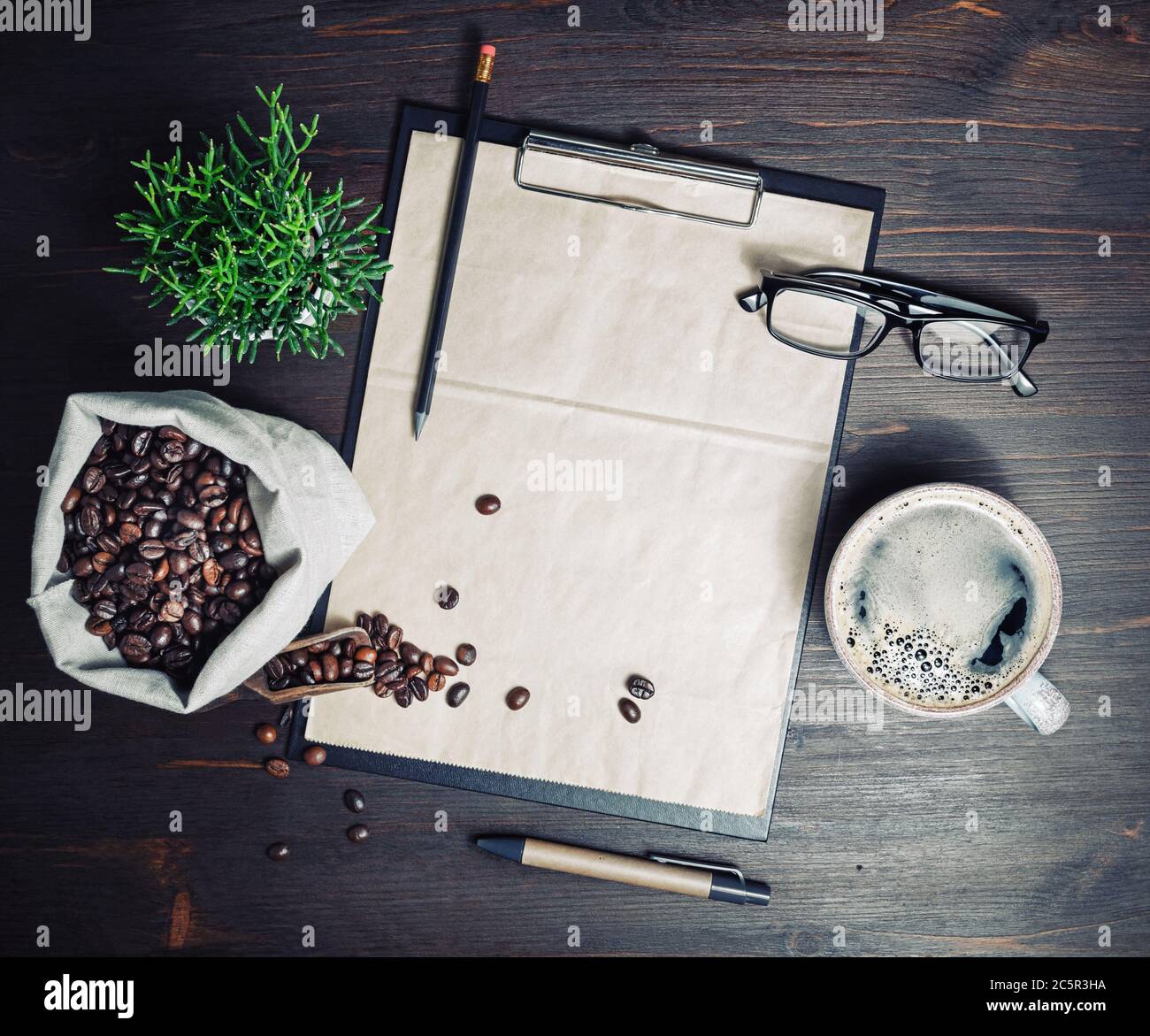 Menu and coffee. Clipboard with blank kraft letterhead, coffee cup ...