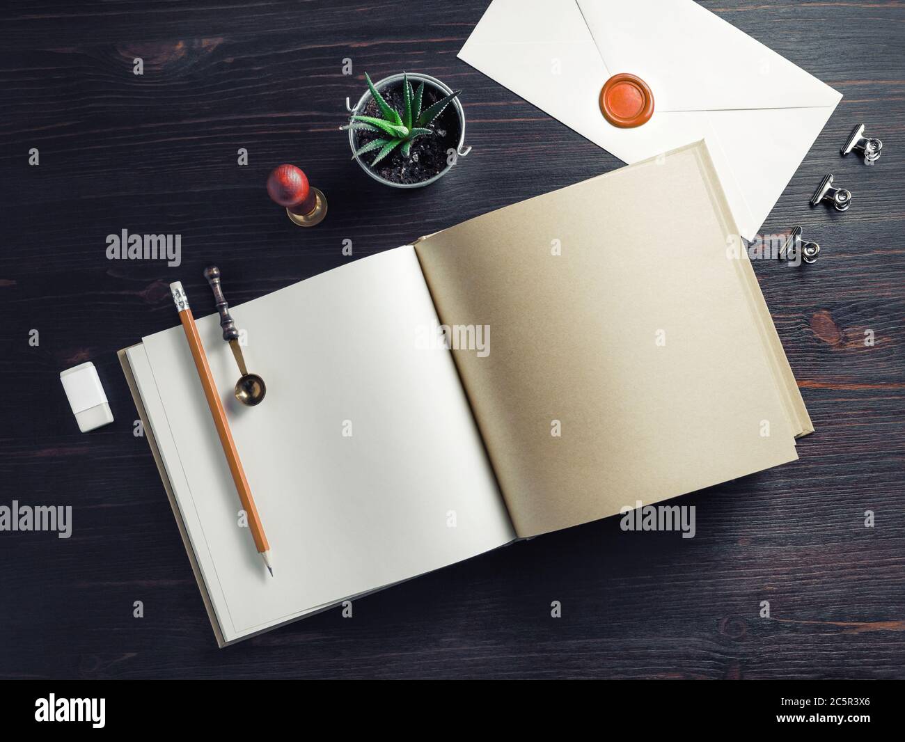 Vintage stationery set on wooden background. Responsive design mockup ...