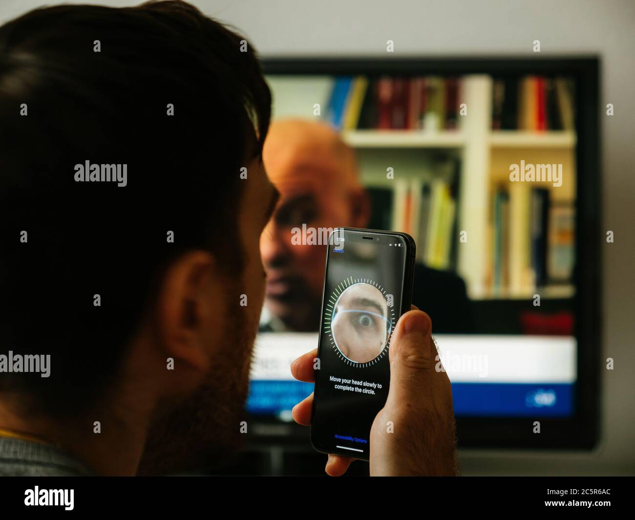 Paris, France - Nov 10 2017: Eye in the screen camera Man setting new ...