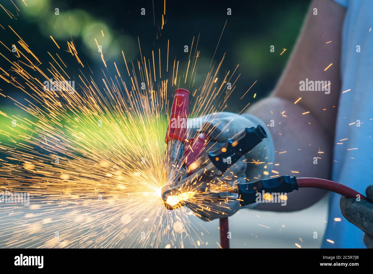 Sparks from car battery connection Stock Photo - Alamy