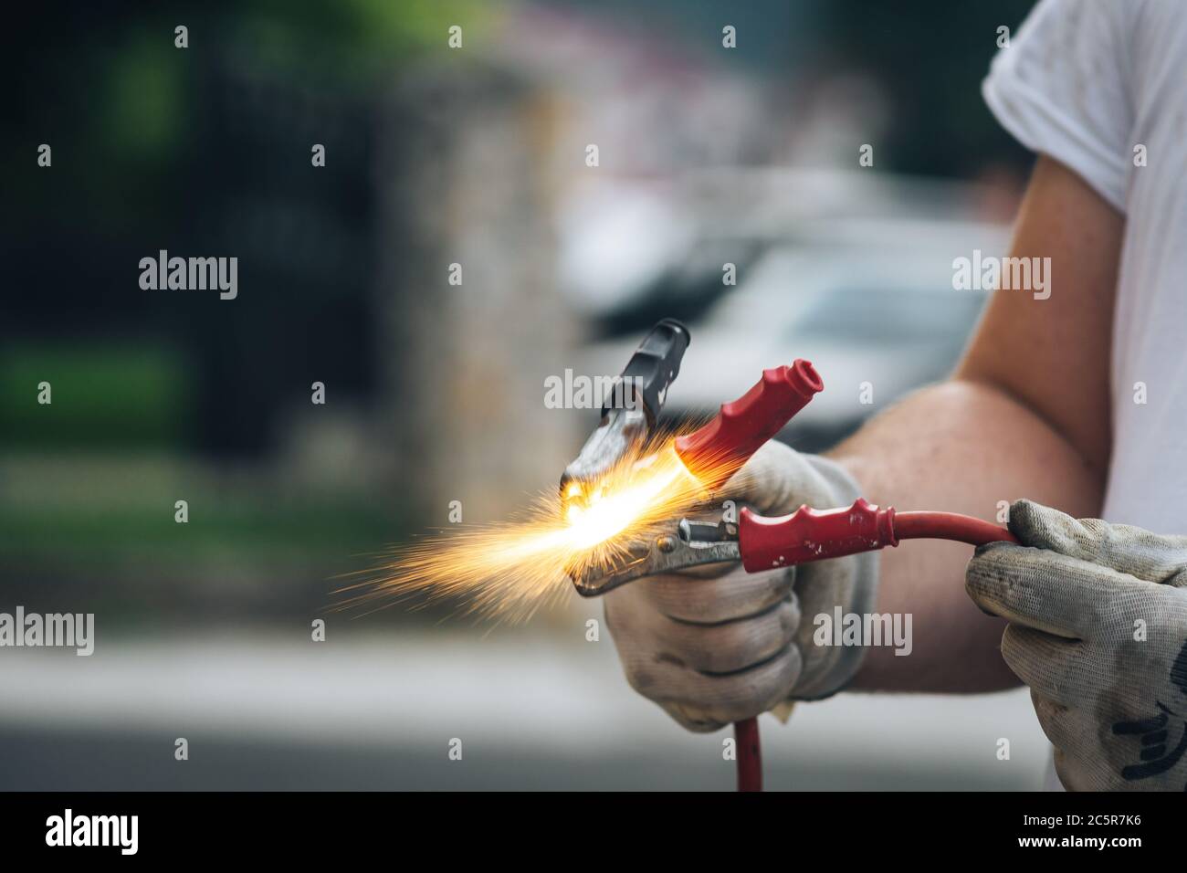 Sparks from car battery connection Stock Photo - Alamy