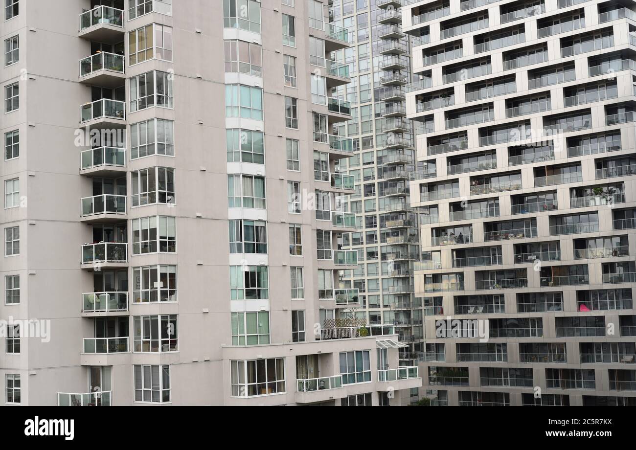 A view of balconies and windows in residential highrise buildings ...