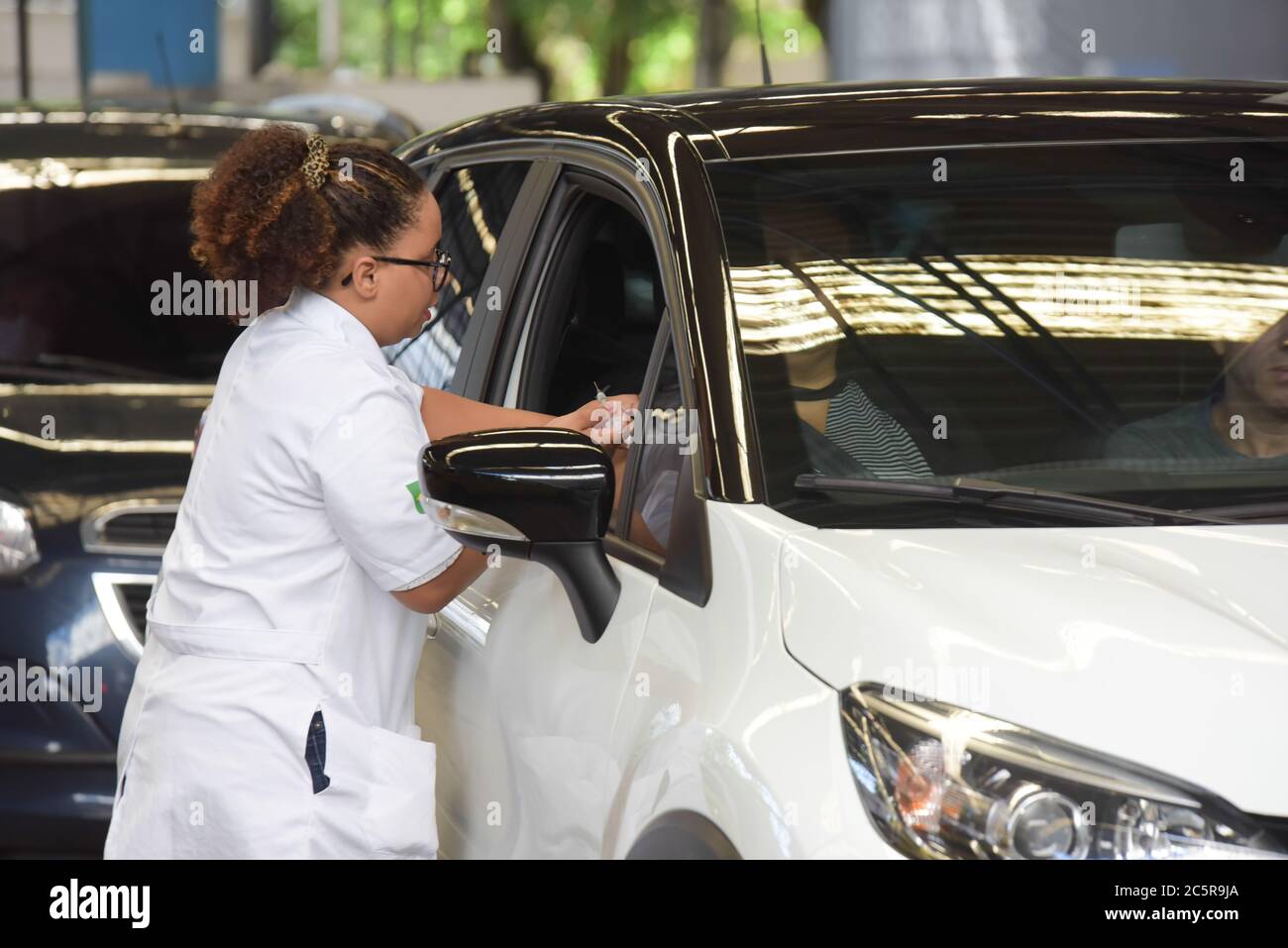 RIO DE JANEIRO,BRAZIL,ARCH,23,2020: flu vaccine in elderly people ...