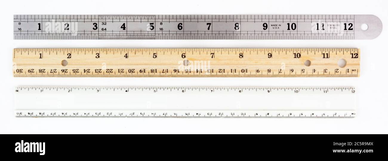 Three rulers: metal, wood, and plastic. Horizontal. Isolated Stock ...
