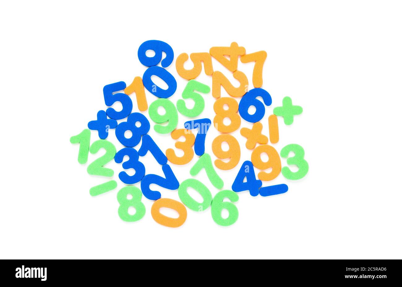 colorful foam numbers and math symbols in jumbled disorder isolated on ...