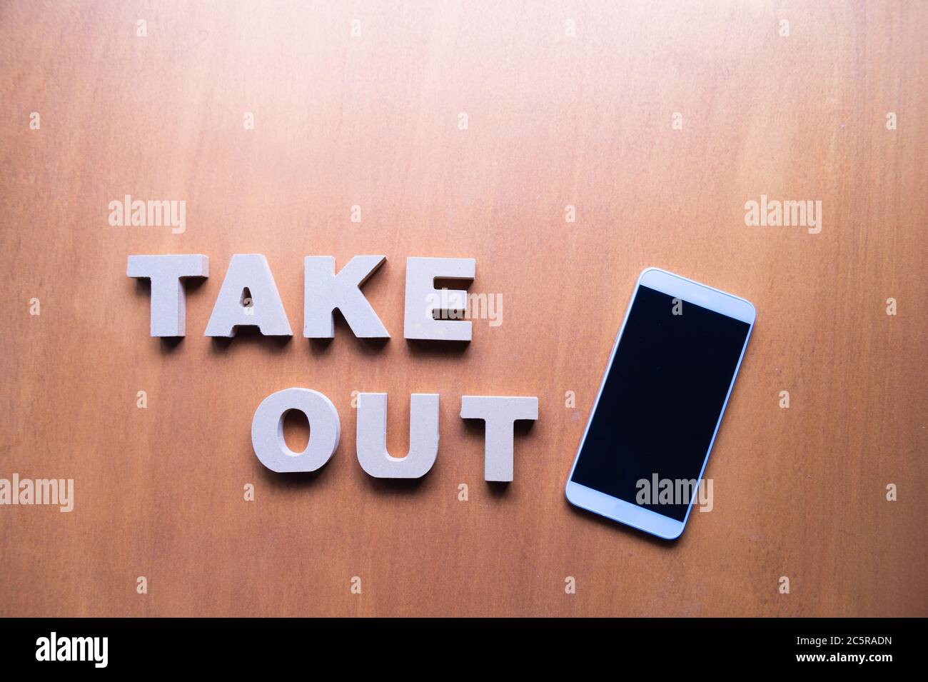 Use mobile phone to use delivery service concept ,take out text and ...