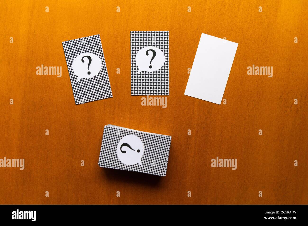 Question mark heap on table concept for confusion, question or solution ...