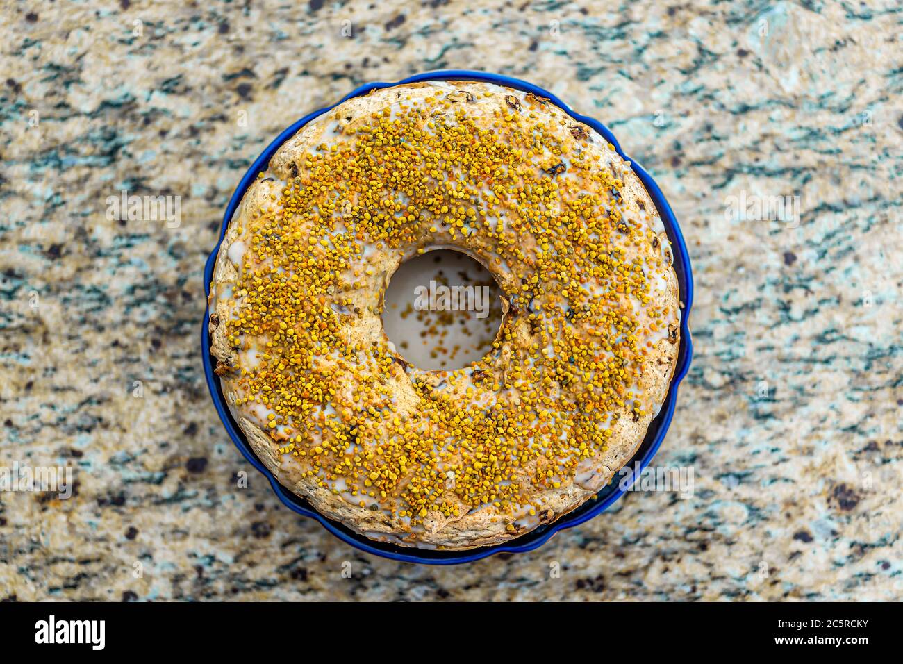 Whole yellow vanilla cream dessert homemade bundt cake with icing ...