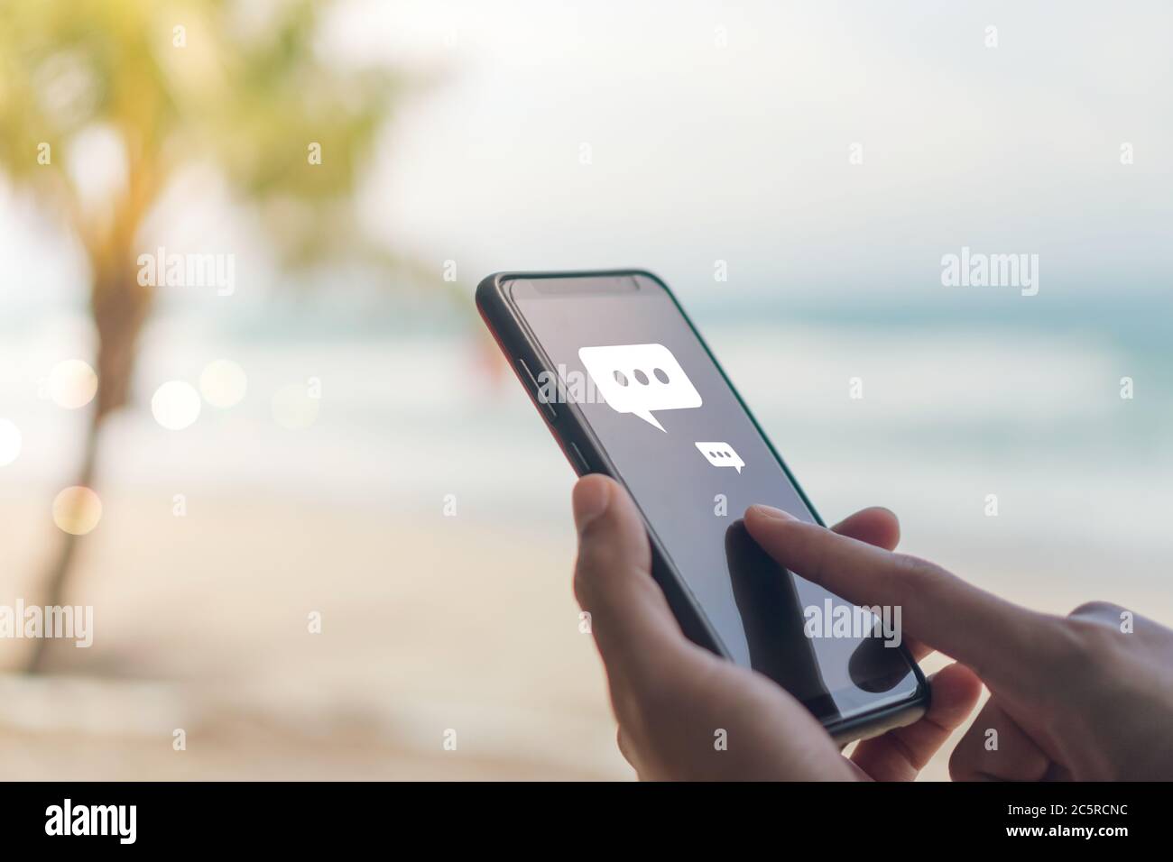 Women hand using smartphone typing, chatting conversation in chat box ...