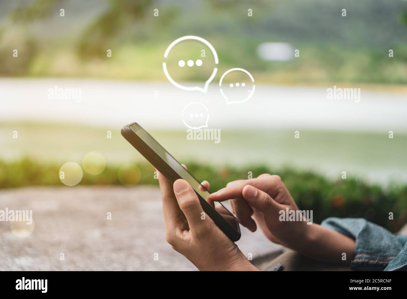Women hand using smartphone typing, chatting conversation in chat box ...