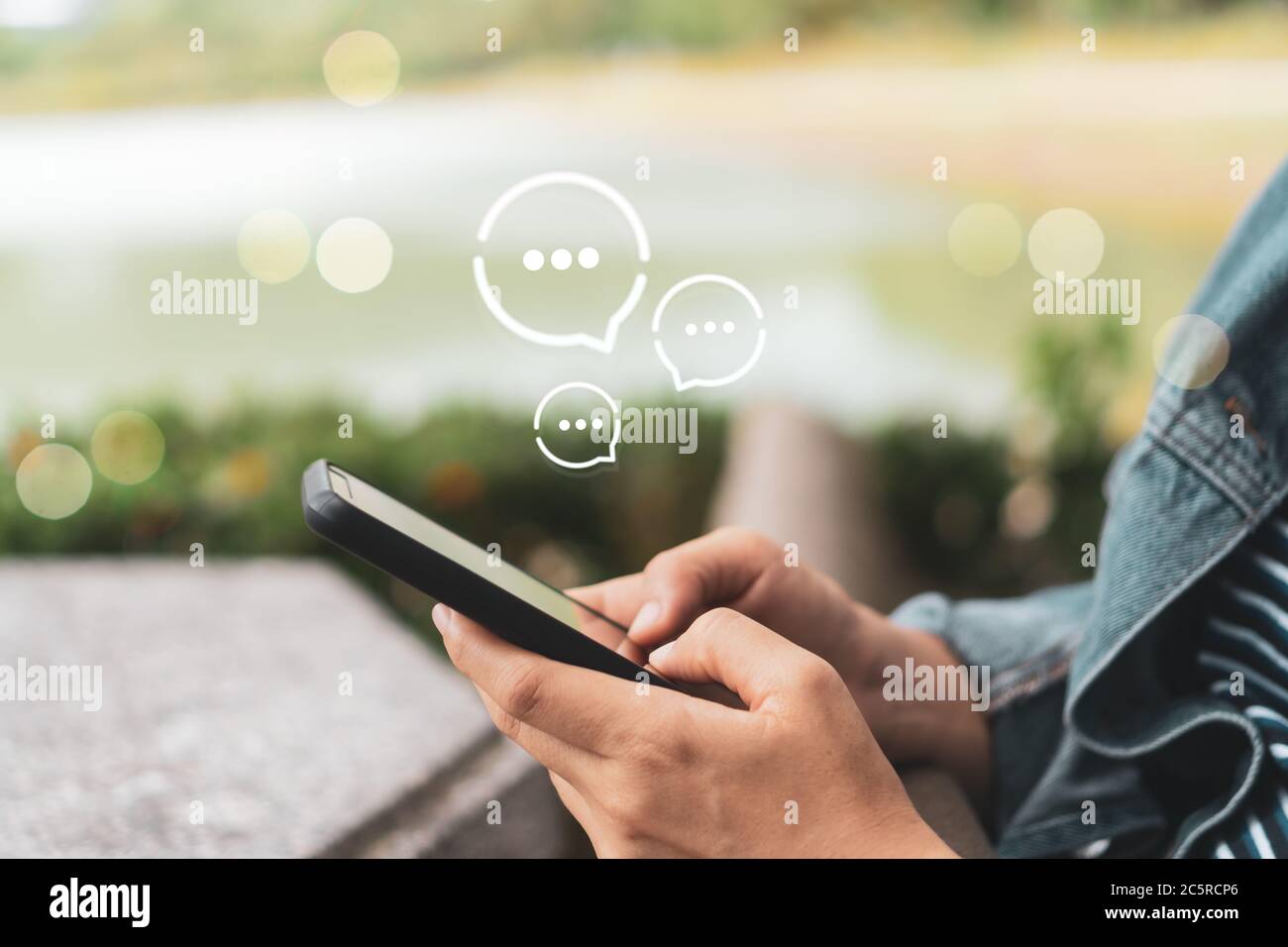Women hand using smartphone typing, chatting conversation in chat box ...