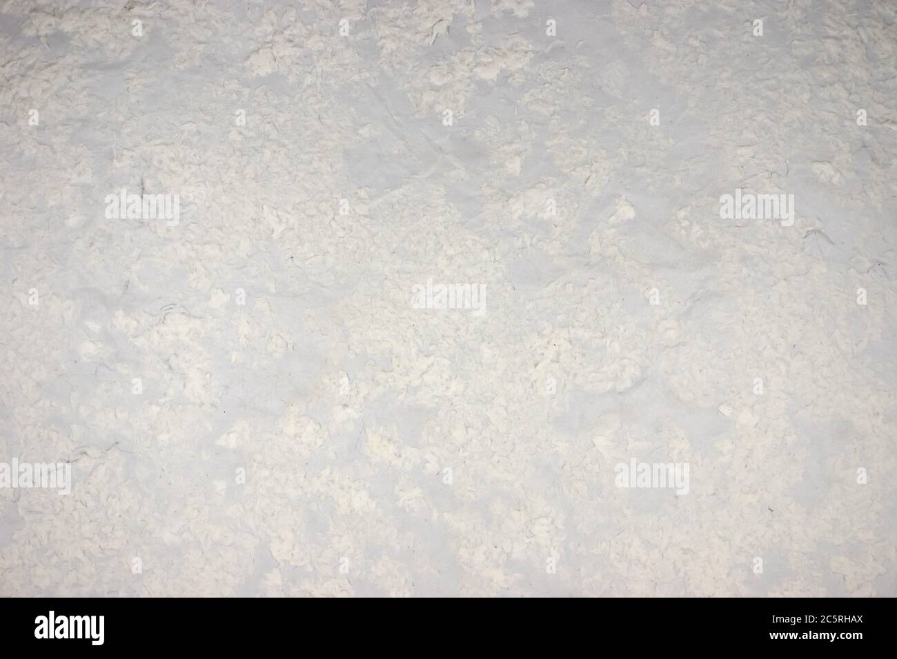 Handmade recycled paper background texture with rough patches Stock ...