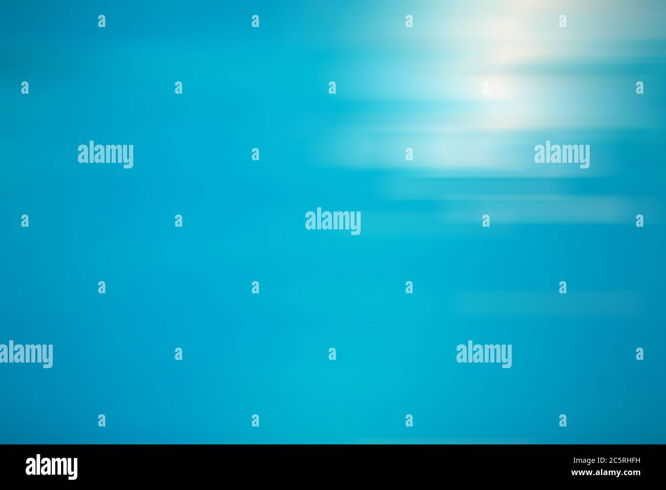 Soft focus bokeh light effects over a rippled, blue water background in the pool Stock Photo - Alamy