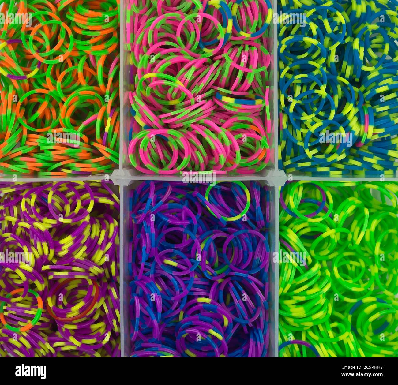 Colorful background rainbow colors rubber bands loom Stock Photo - Alamy