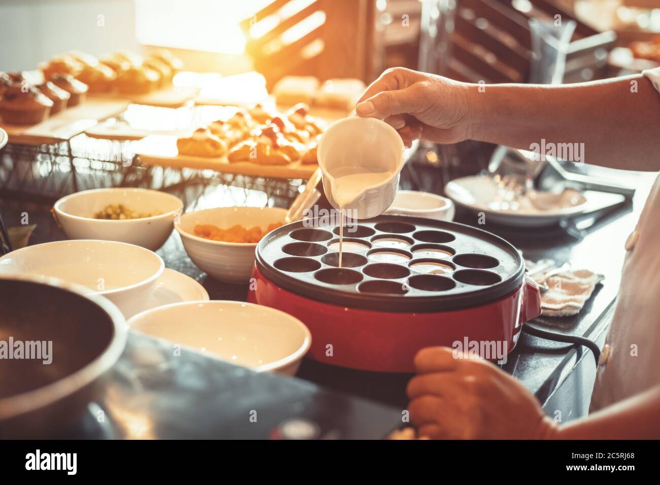 Woman pouring coconut milk hi-res stock photography and images - Alamy