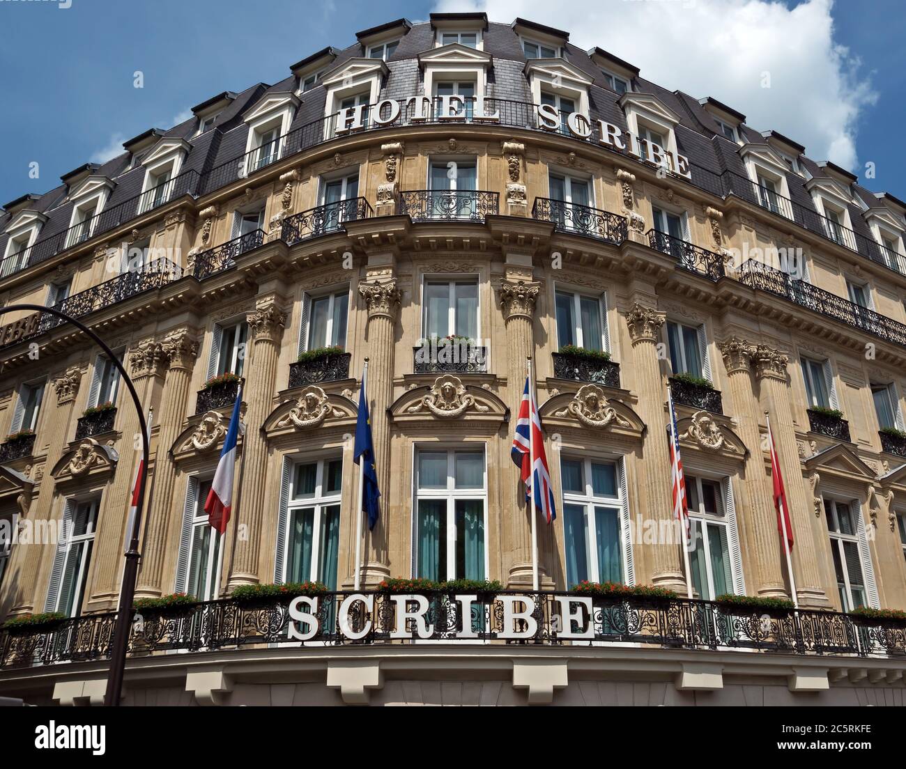 PARIS, FRANCE - JUNE 11, 2014: Building of the Hotel Scribe. Located in ...