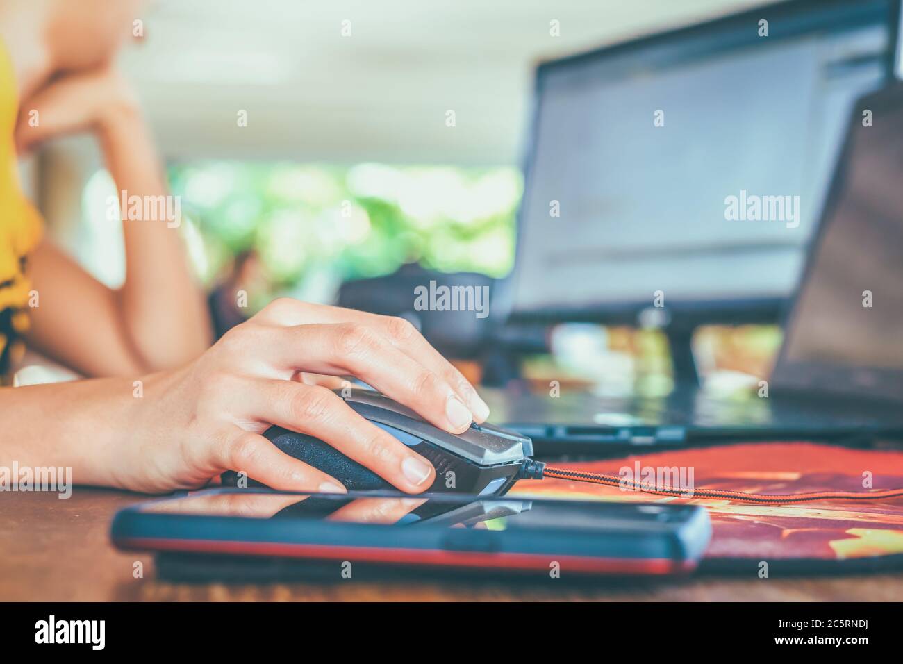 Woman hand clicking wireless mouse hi-res stock photography and images - Alamy