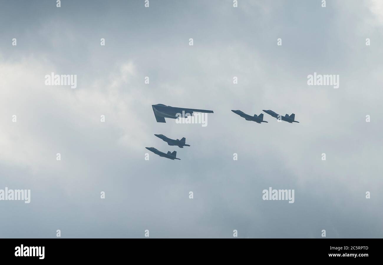 New York, NY - July 4, 2020: B-2 Stealth Bomber with escort of F-35 ...